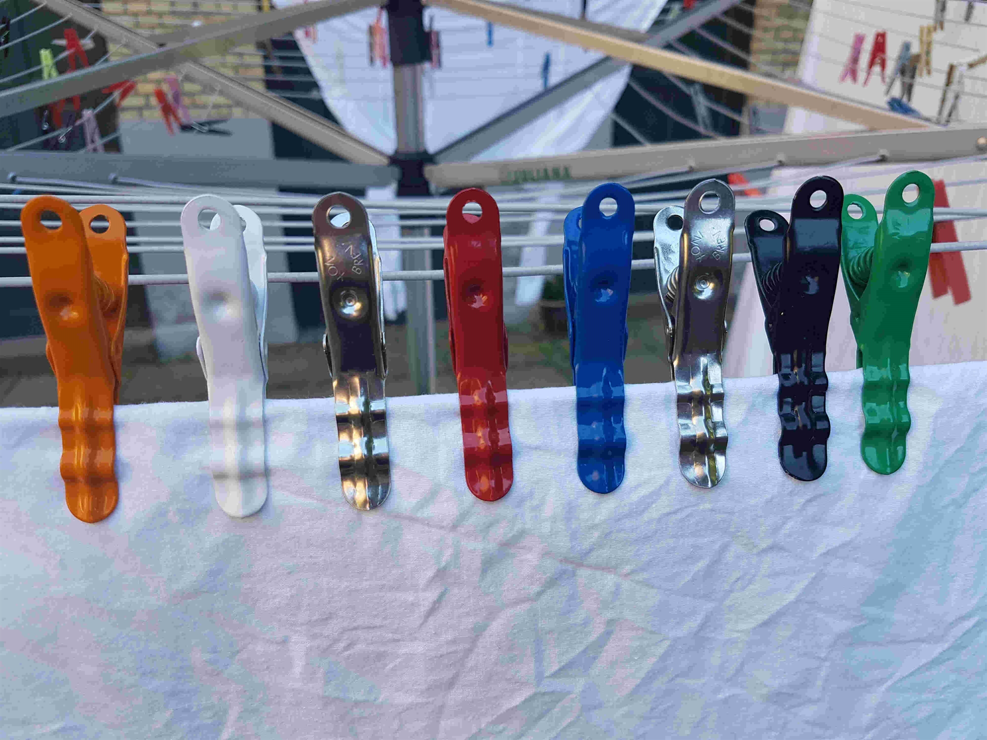 Omega clothes pegs, 20 years warranty, stainless, red