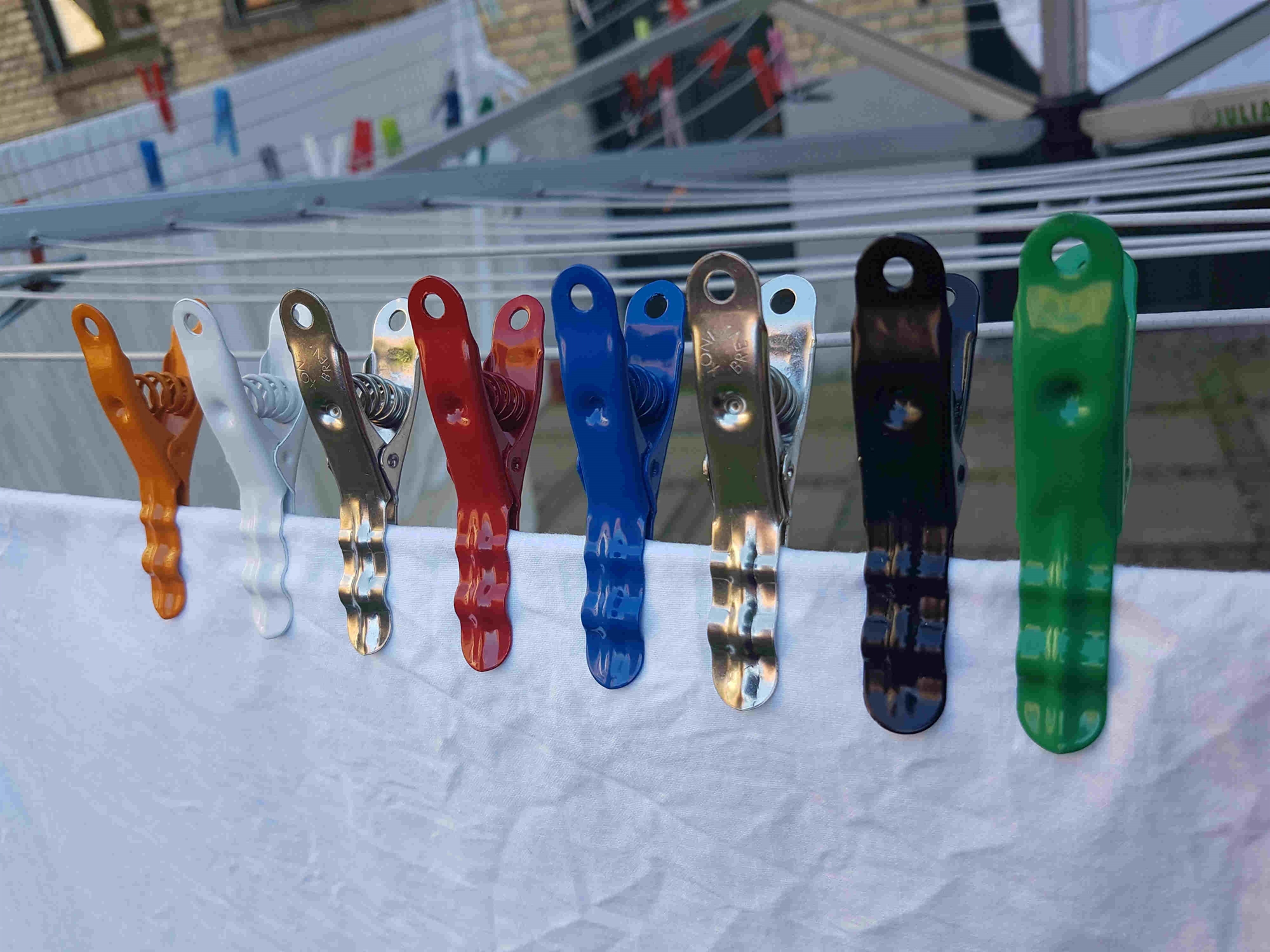 Omega clothes pegs, 20 years warranty, stainless, red